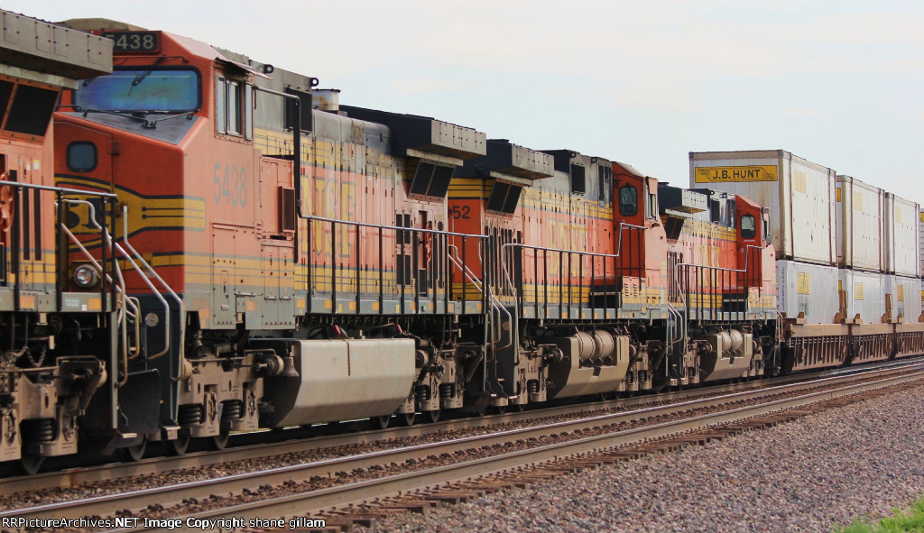 BNSF 5438 is 2nd out on this wb stack train.